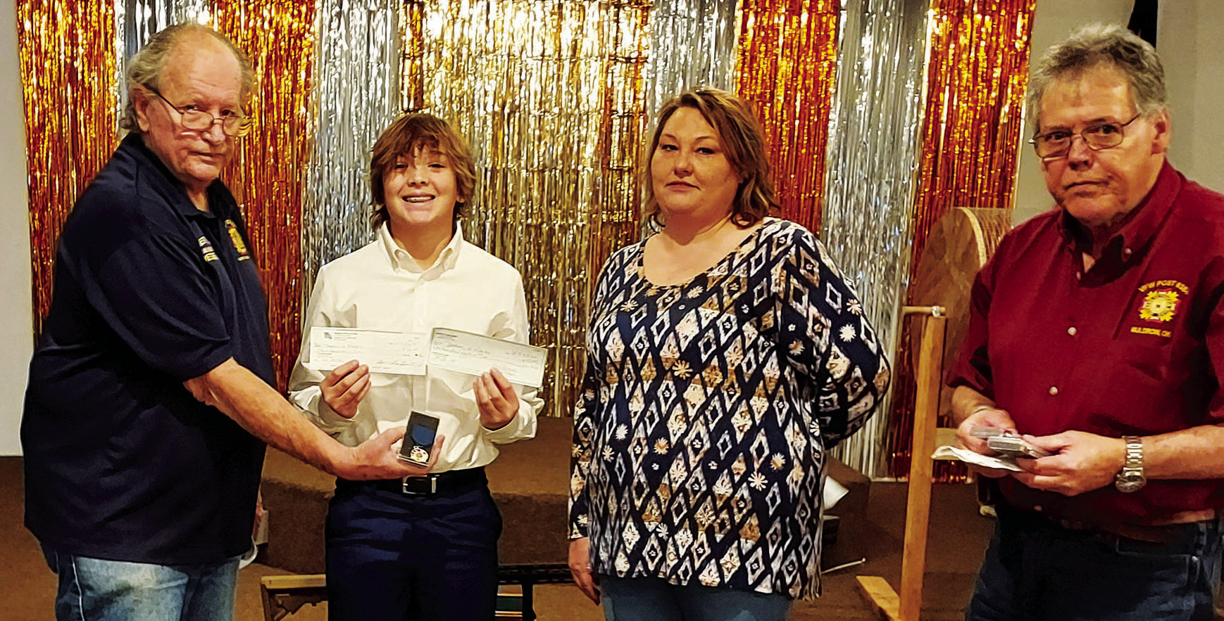 Pictured from the left are Ed McLaughlin - Eastern Times Register